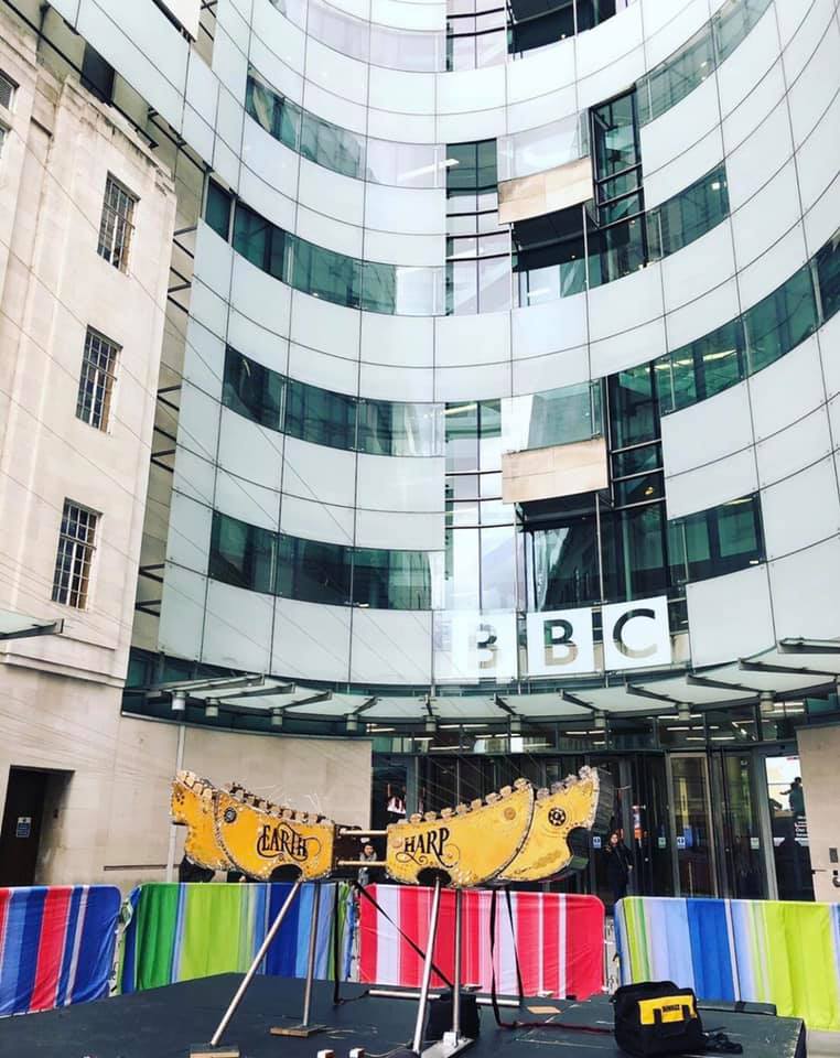 William Close strings The Earth Harp in the BBC Plaza - concept artists